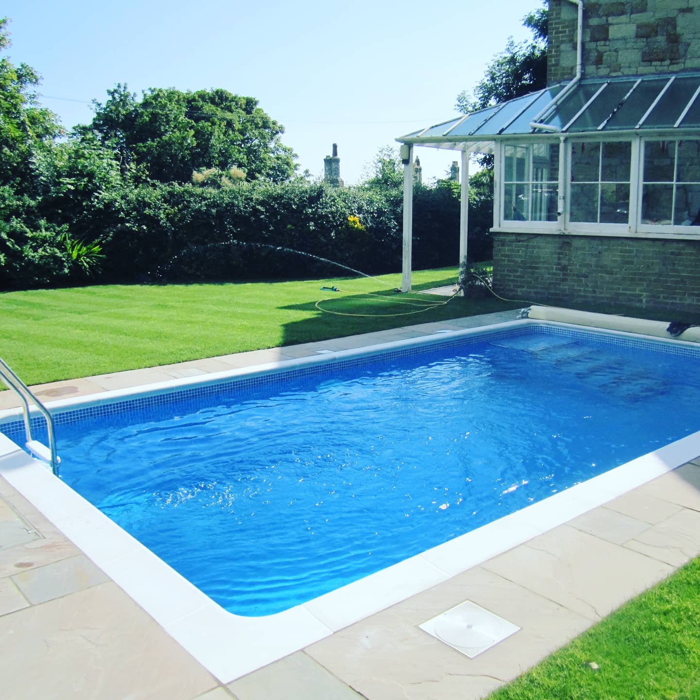 Dive into Luxury with Custom Swimming Pools | Sandrock Construction